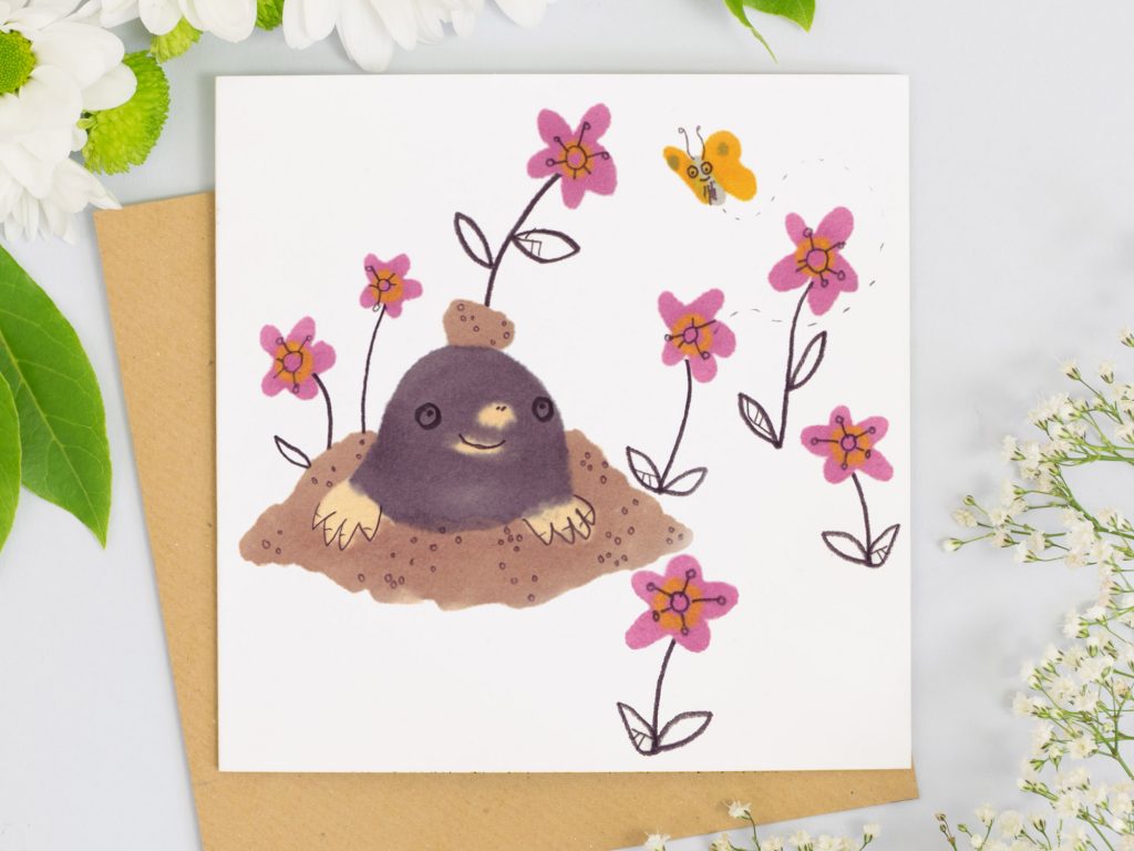 Little mole birthday card saying hello beneath pretty flowers and ...